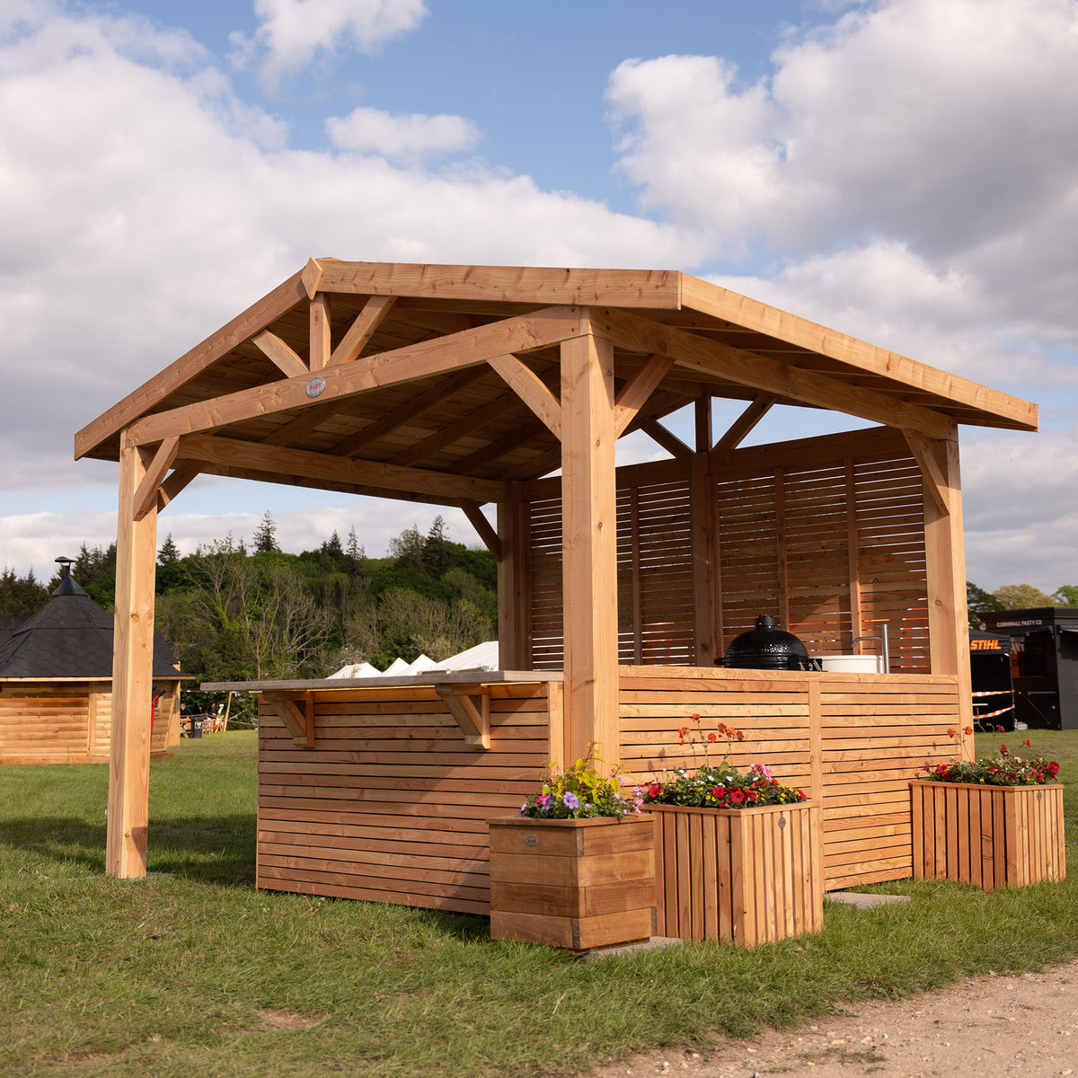 Planed Larch Pergola - Apex - With Overhang - Cedar Featheredge Roof – Ruby Group